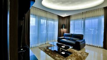 Suite Familiar | Sala | Televisor LCD de 32 polegadas com canais via satélite, televisor