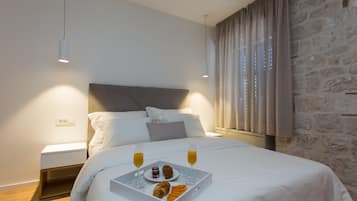 1 quarto, roupas de cama premium, frigobar, cofres nos quartos