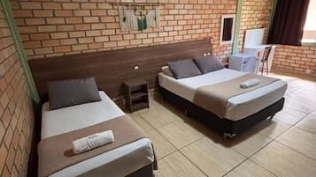 Suite Plus 1 andar | 1 quarto, escrivaninha, Wi-Fi de cortesia, roupa de cama
