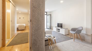 Apartamento Deluxe, 2 Quartos, Terraço, Vista Jardim | Lençóis de algodão egípcio, camas de colchão Tempur-Pedic