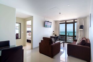 Suíte, várias camas, para não fumantes (Beachfront) | Roupas de cama premium, edredons de pluma, camas com colchões pillow-top