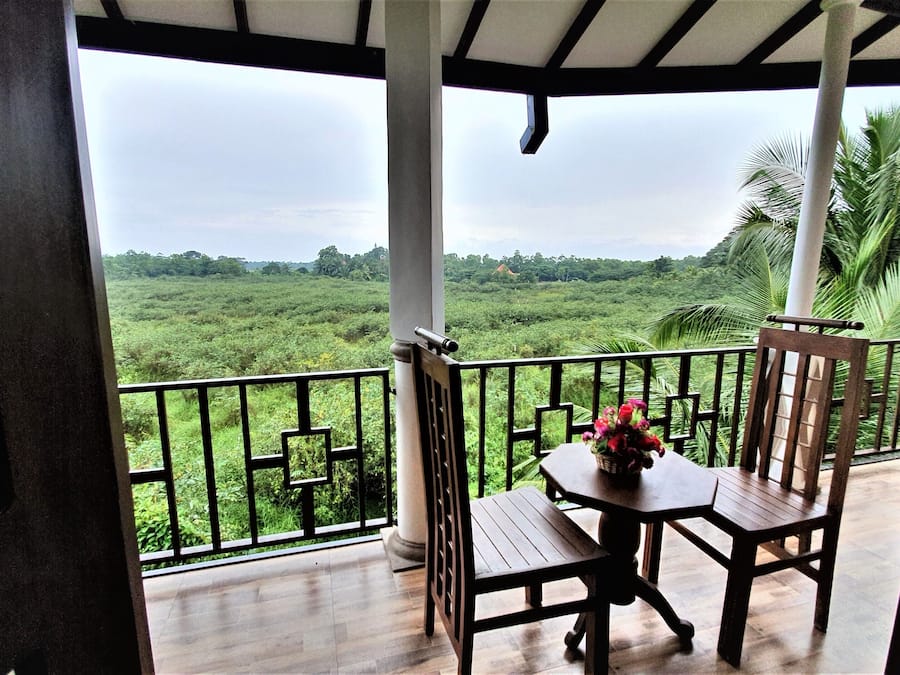 Quarto Triplo Comfort, vista para o jardim | Varanda