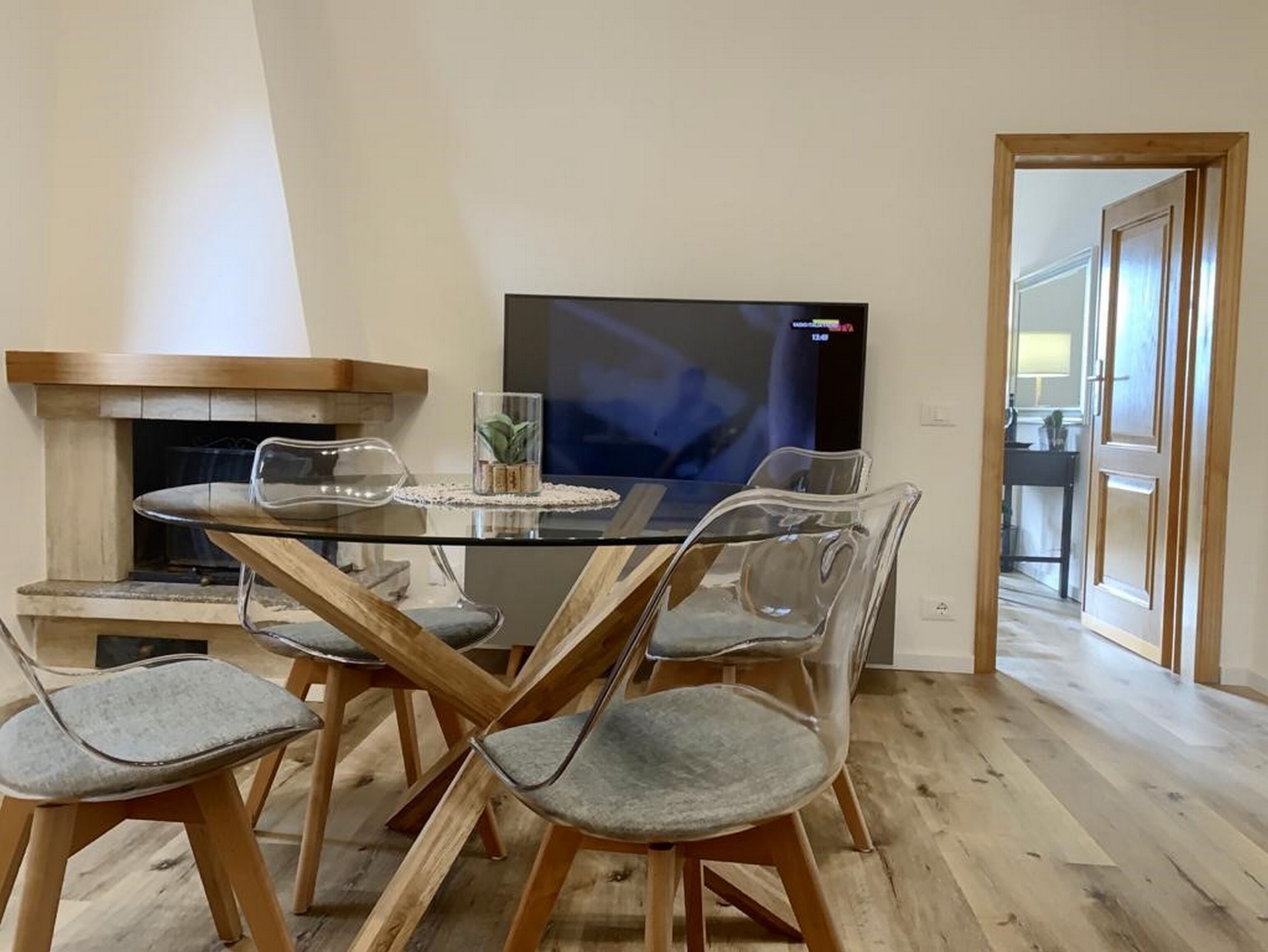 Apartamento tradicional, 1 quarto, vista para o jardim | Área de estar | TV