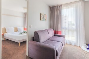 Apartamento, 1 quarto | Secretária, secretária adequada para computadores portáteis