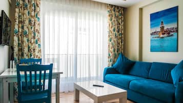 Apartamento standard | Sala de estar | TV LCD