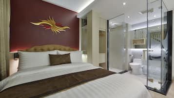Quarto Deluxe | Minibar, cofre no quarto, secretária, cortinas/cortinados opacos