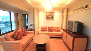 Suite room | Sala de estar | TV