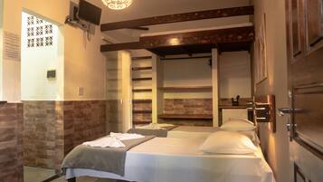 Suite Premium | 1 quarto, minibar, Wi-fi grátis, roupa de cama fornecida