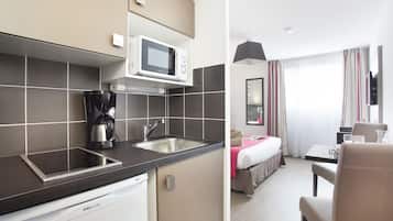 Um frigorífico, um micro-ondas, uma placa de cozinha