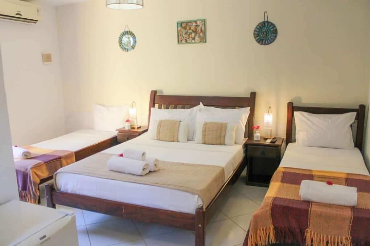 Quarto quádruplo superior | Frigobar, cortinas blackout, quartos à prova de som, berços grátis