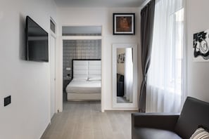 Classic Condo (passeggiata di Ripetta 25) | Sala de estar | TV de tela plana 32 polegadas com canais via satélite, TV