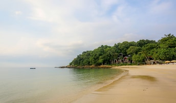 Na praia, toalhas de praia