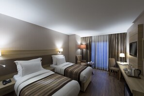 Roupa de alta qualidade, minibar grátis, cofre no quarto 
