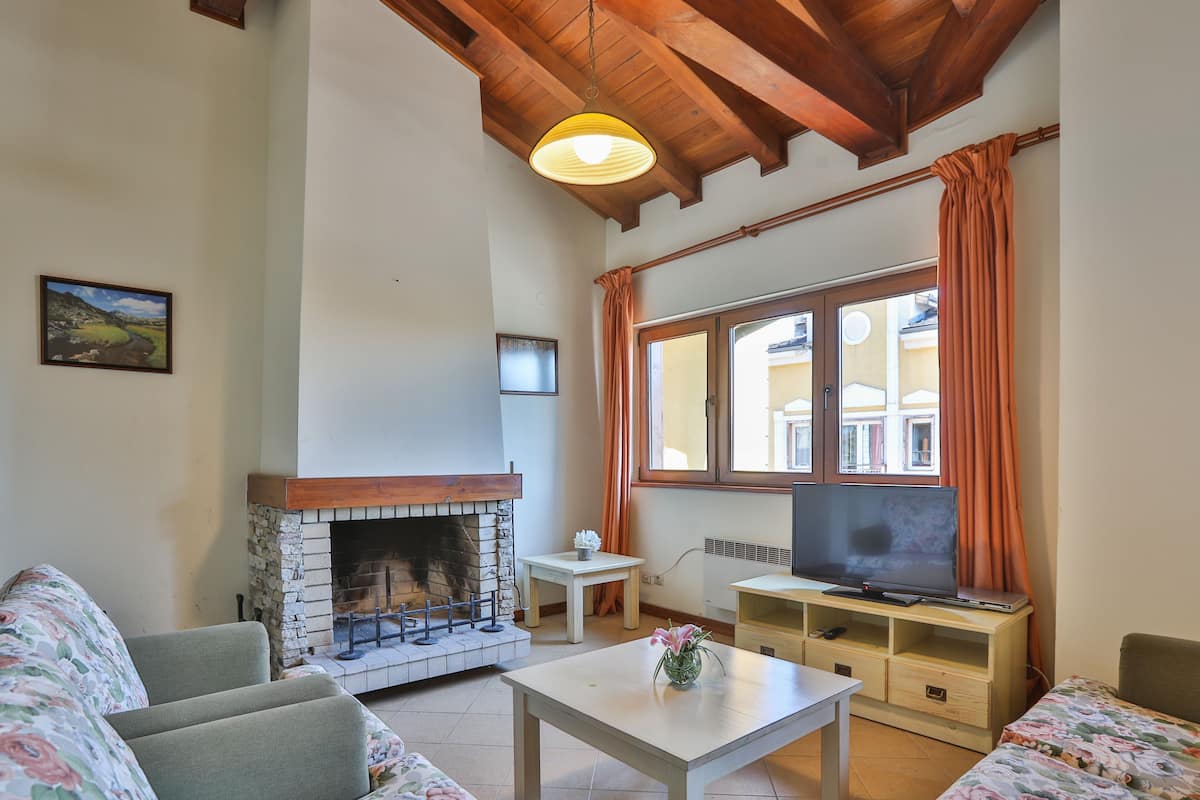 Apartamento | Sala de estar | Televisor, leitor de DVD