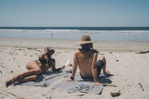 Na praia, Prática de surfe/bodyboard 