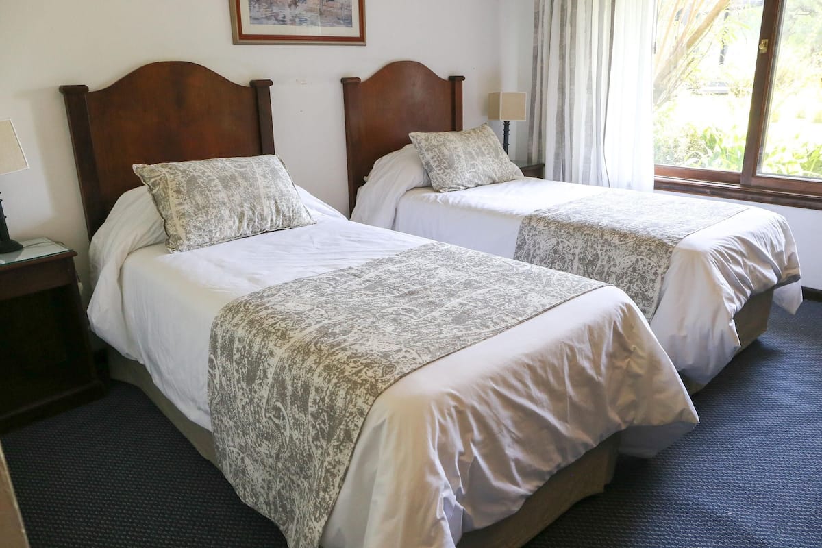 1 quarto, roupas de cama premium, edredons de pluma, frigobar