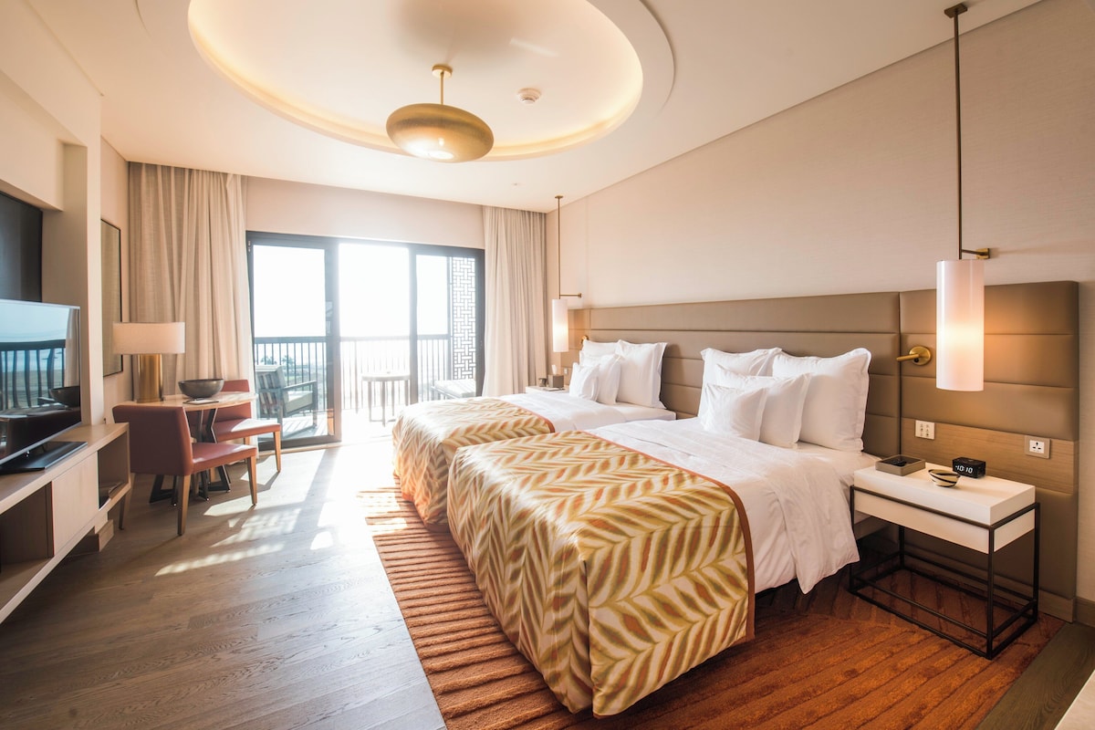 Roupa de alta qualidade, camas de colchão Select Comfort, minibar 