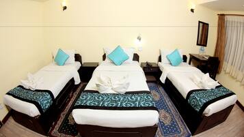 Quarto Triplo Deluxe | Secretária, Wi-fi grátis