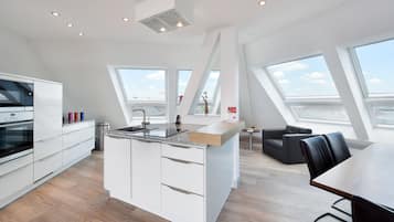 Suíte, 2 quartos, terraço | Cozinha privada