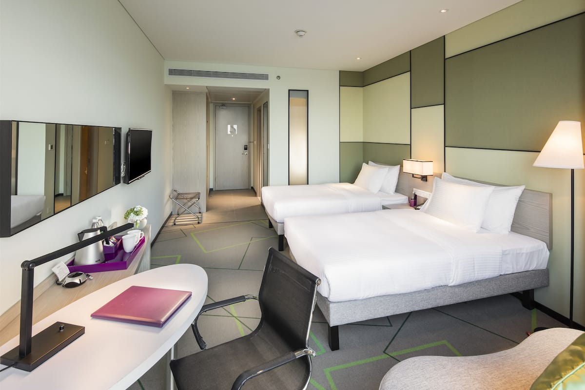 Quarto standard, 2 camas de solteiro | Roupas de cama premium, cofres nos quartos, escrivaninha, berços grátis