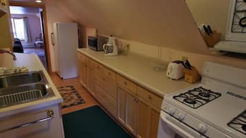 Suíte econômica, 2 quartos, para não fumantes, cozinha | Cozinha privada | Frigobar, micro-ondas, cafeteira/chaleira