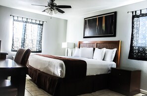 Apartamento, 1 quarto, cozinha | Escrivaninha, Wi-Fi de cortesia, roupa de cama