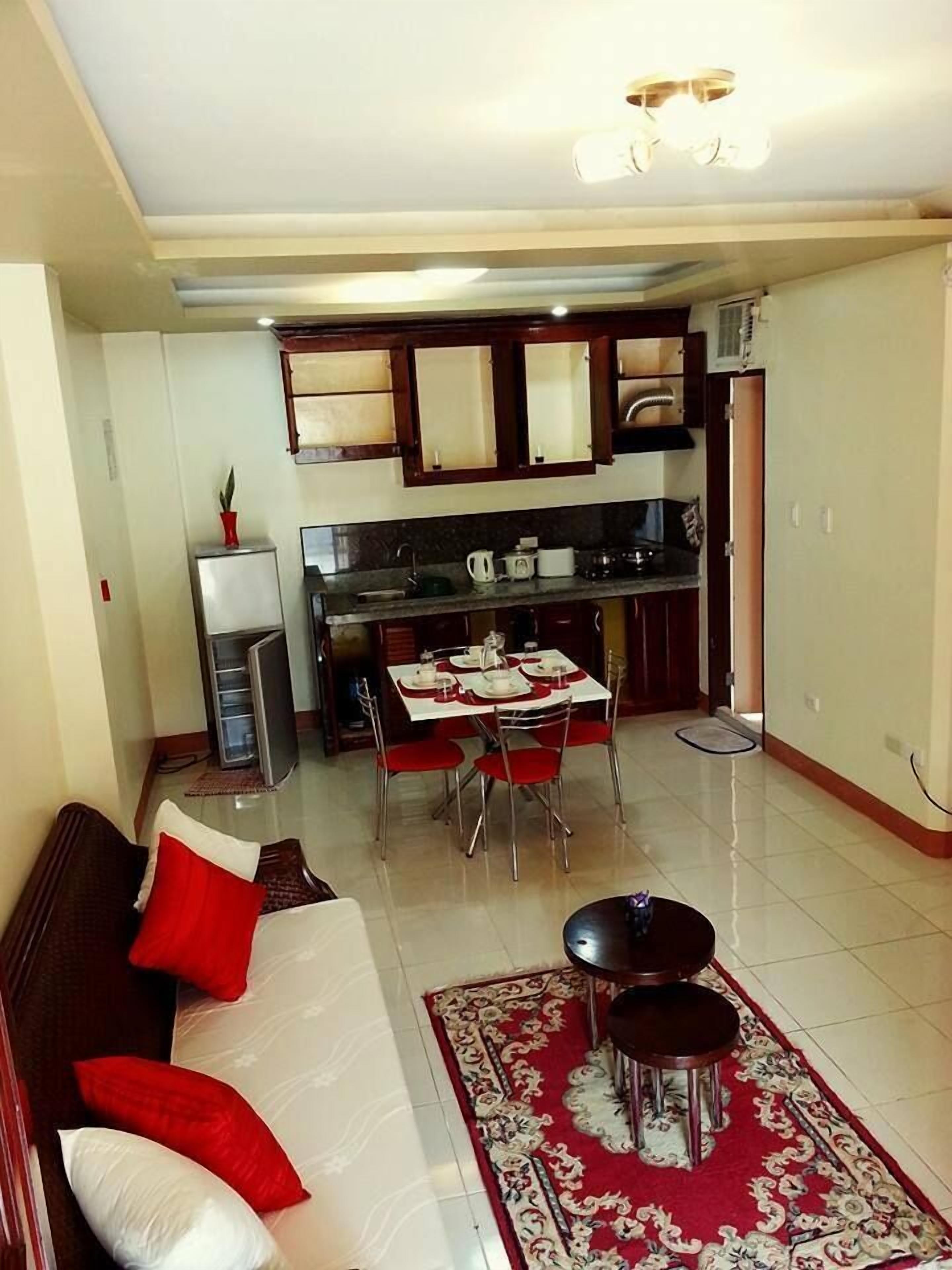 Apartamento, 3 quartos (Furnished) | Sala | Televisor LCD de 32 polegadas com canais por cabo, televisor 