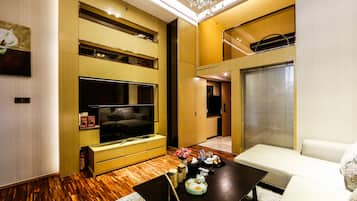 Quarto Twin Executivo | Sala | TV de ecrã plano