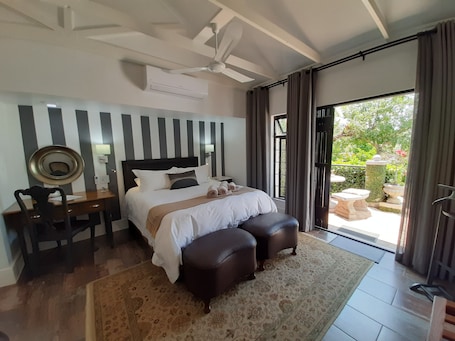 Suíte superluxo, 1 quarto, vista para o jardim | Cofres nos quartos, individualmente decorados. At 98 on Lynburn Guest House