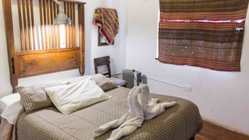 Suite Exclusiva, 1 cama queen-size, casa de banho privativa, vista para a montanha | Casa de banho | Um polibã, um secador de cabelo, toalhas fornecidas
