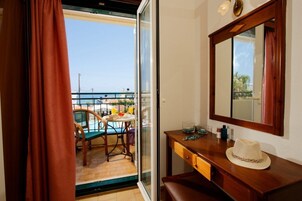 Quarto casal ou duplo | Área de estar | TV de tela plana