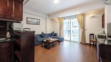 Suite | Sala de estar | Televisor de 32 polegadas com canais por cabo