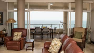 Apartamento | Área de estar | TV de tela plana, DVD player