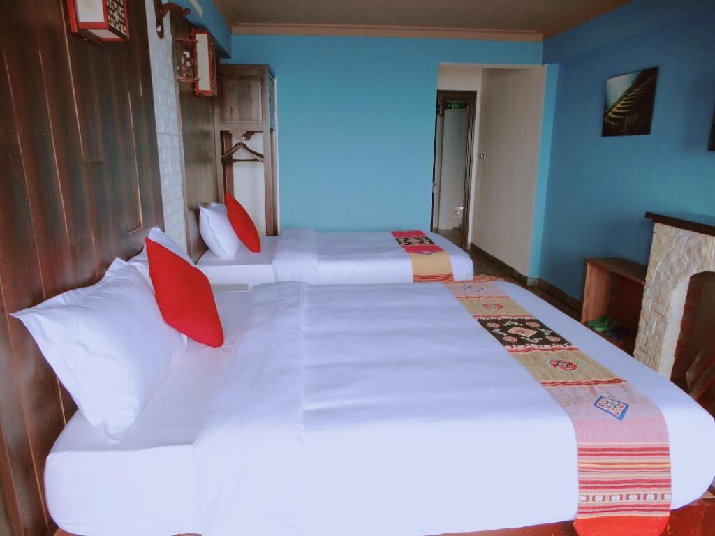 Escrivaninha, cortinas blackout, Wi-Fi de cortesia, roupa de cama
