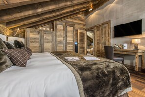 Suíte panorâmica | Roupas de cama premium, frigobar, cofres nos quartos