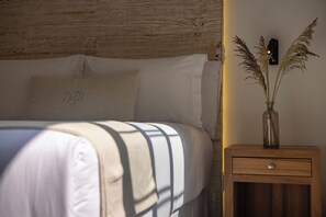 Suite Junior con Terraza Privada | Edredons de pluma, frigobar, cofres nos quartos, cortinas blackout