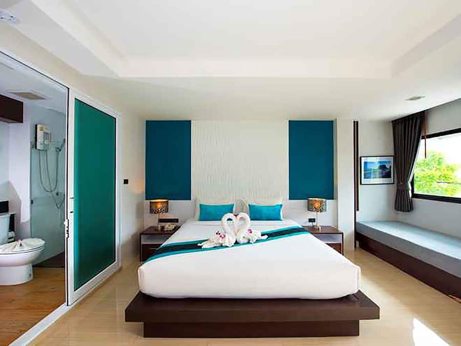 Deluxe King Room | Frigobar, cofres nos quartos, escrivaninha, cortinas blackout