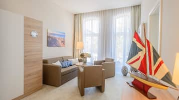 Suíte | Sala de estar | TV de tela plana