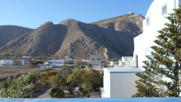 Apartamento Superior, 2 quartos, quartos comunicantes, vista para o mar | Vista para a montanha