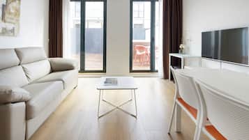Suite, terraço | Sala | TV de ecrã plano