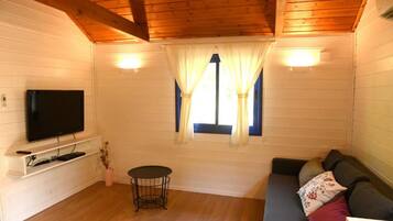 Cabana (Log) | Área de estar | TV de tela plana