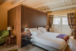 Quarto Duplo | Minibar, cofre no quarto, cortinas/cortinados opacos 