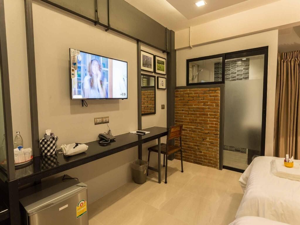 Escrivaninha, cortinas blackout, Wi-Fi de cortesia