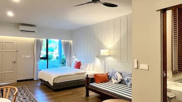 Apartamento família, 2 quartos | Individualmente decorados, individualmente mobiliados, escrivaninha