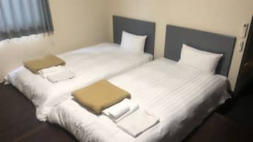 Quarto duplo tradicional, para não fumantes | Wi-Fi de cortesia, roupa de cama
