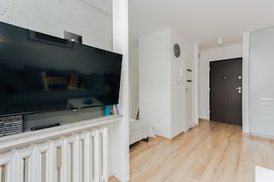 Apartamento | Área de estar | TV de tela plana