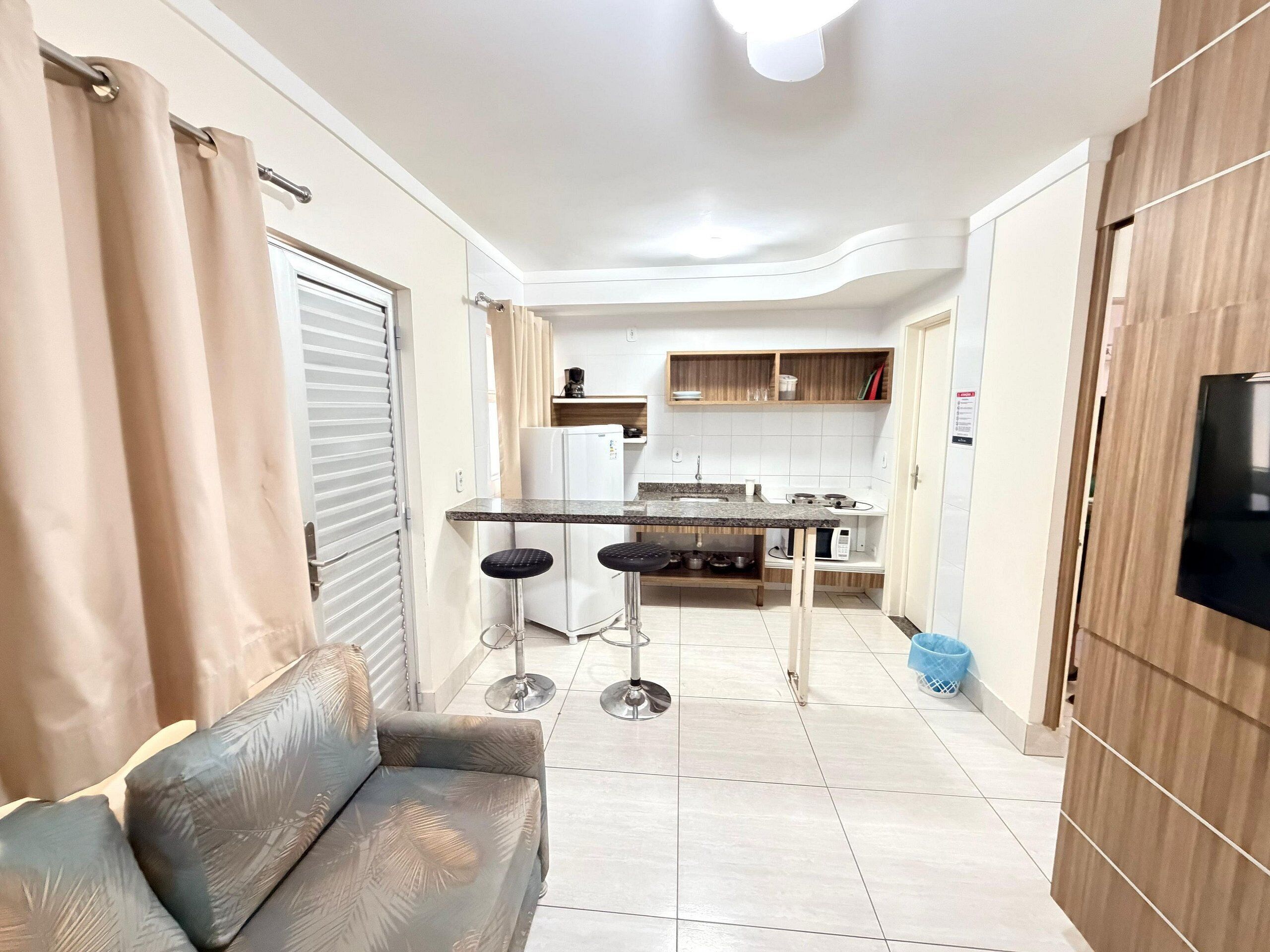 Apartamento | Área de estar | TV