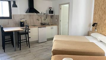 Estúdio (3 pax) | Sala | TV de ecrã plano