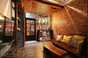 Dormitório compartilhado conforto, 2 camas de solteiro | Área de estar