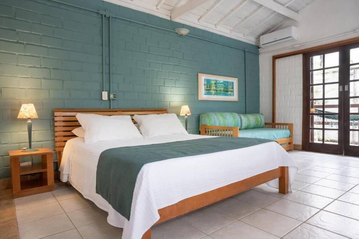 Quarto casal luxo de uso individual | Frigobar, cortinas blackout, Wi-Fi de cortesia